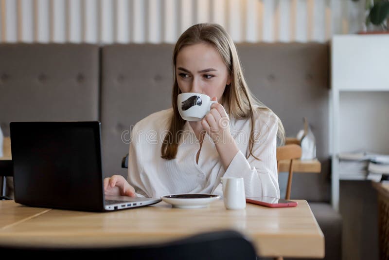 Young Businesswoman on a Coffee Break. Using Tablet Computer Stock ...