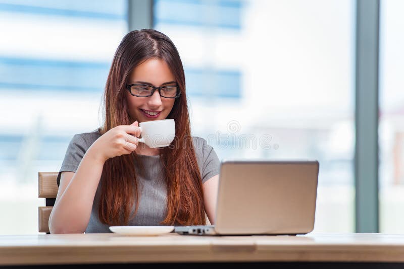 The Young Businesswoman Drinking Tea in Office Stock Photo - Image of ...