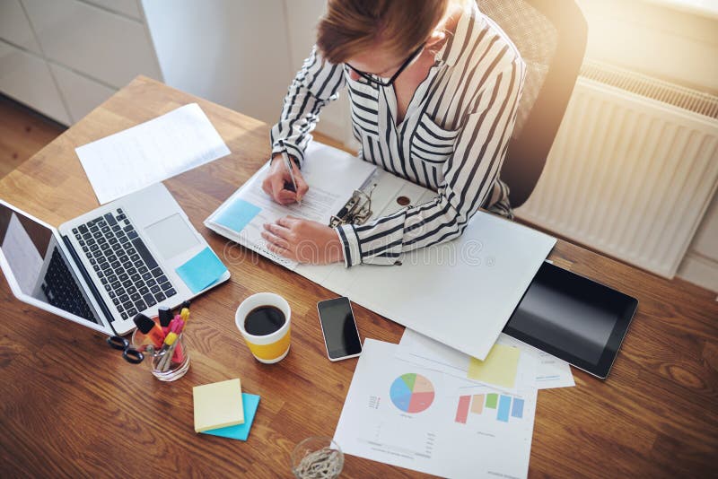 Young Businesswoman Hard at Work at Her Desk Stock Photo - Image of ...