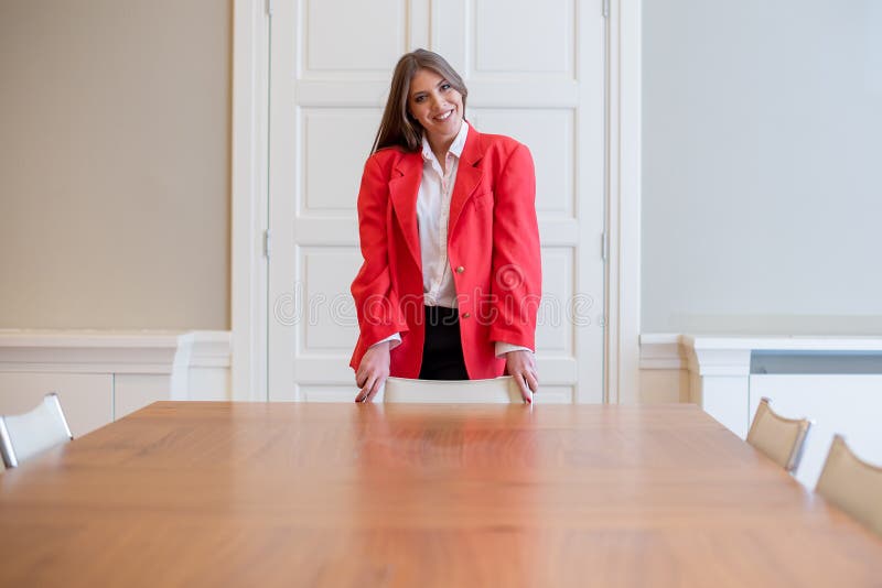 Young Businesswoman Leaning on Table Stock Photo - Image of attractive ...