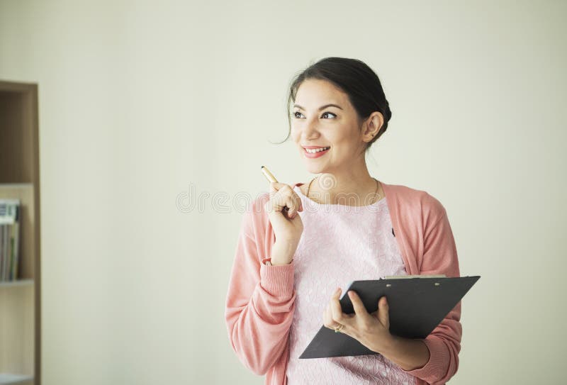 Young Businesswoman Thinking Idea for Work at Office Stock Image ...