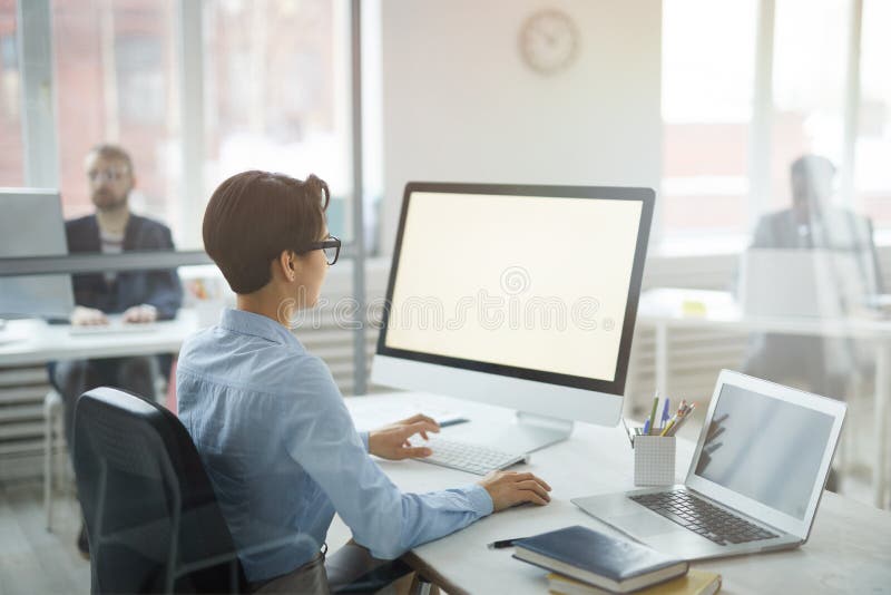 Young Businesswoman Using Computer Stock Photo - Image of table, desk ...