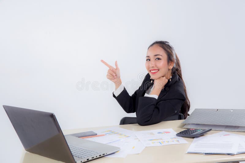 Young Businesswoman Working in Office Pointing Something. Stock Photo ...