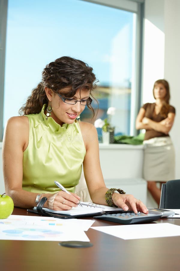 Young Businesswoman Writing Notes Stock Image - Image of career, female ...