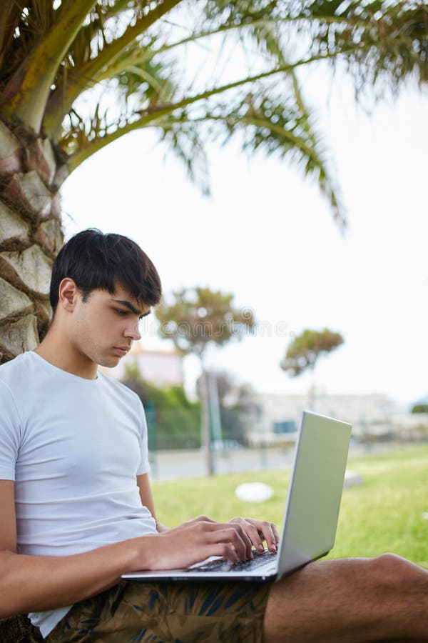 Young Busy Man Sitting Using Laptop Outside Stock Photo - Image of ...