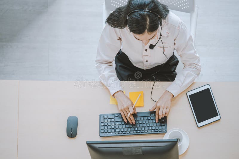 Young Call Center Girl Typing on Computer Keyboard Stock Photo - Image ...