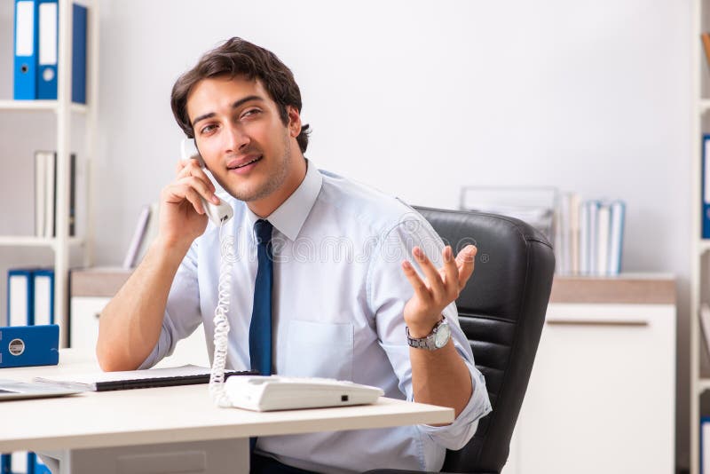 The Young Call Center Operator Speaking on Phone Stock Image - Image of ...