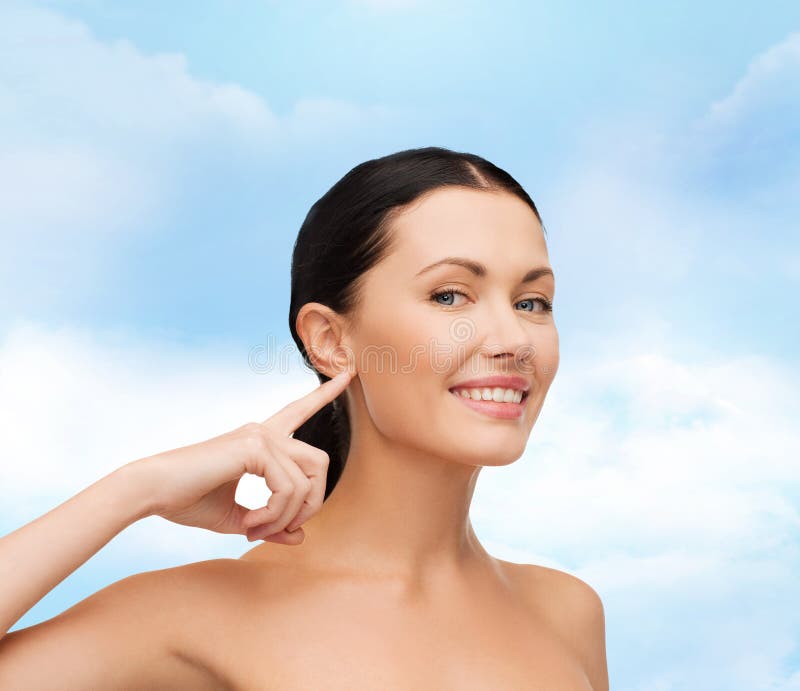 Beautiful Woman Pointing Finger To Her Ear Stock Photos - Free ...