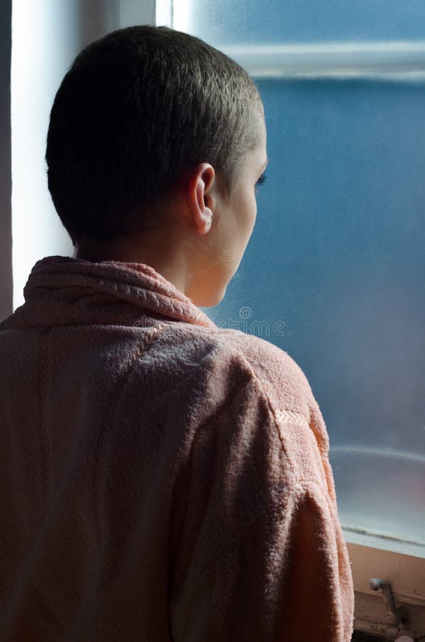 Young Cancer Patient Standing in Front of Hospital Window Stock Image ...