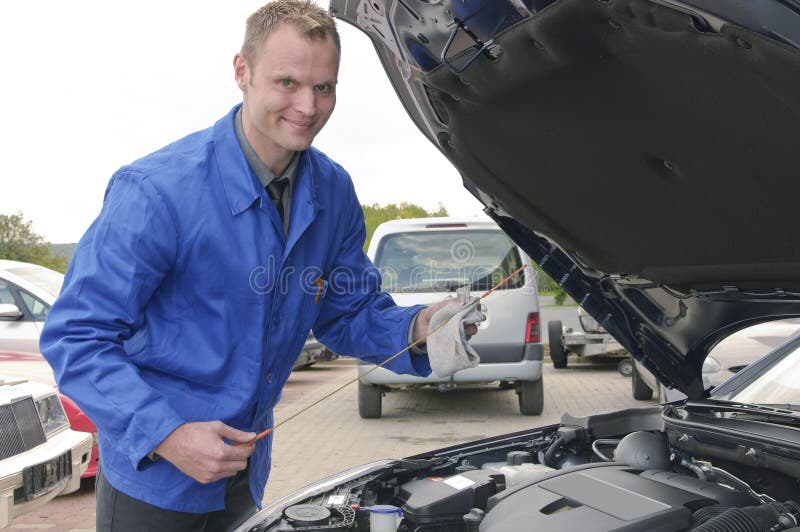 Young Car Mechanic Check a Car Stock Image - Image of customer, craft ...