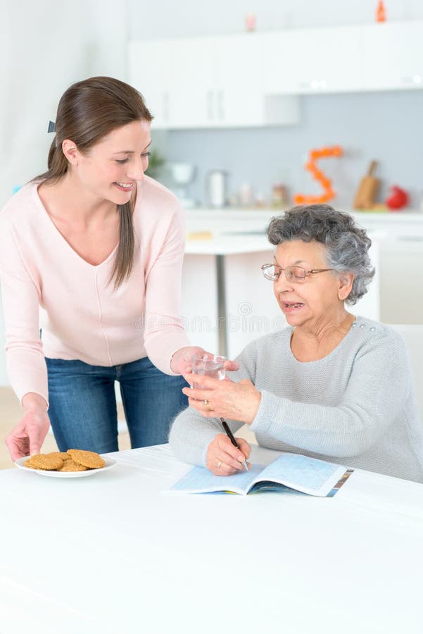Senior Lady Peeling Potatoes Stock Photo - Image of housekeeping ...