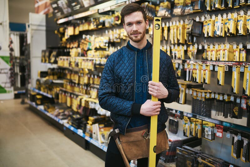 Young Carpenter Holding a Builders Level Stock Photo - Image of artisan ...