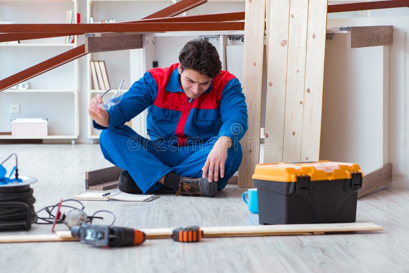 Young Carpenter with Notebook Writing Planning at Construction R Stock ...