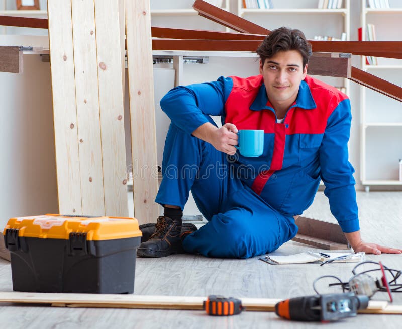 Young Carpenter with Notebook Writing Planning at Construction R Stock ...