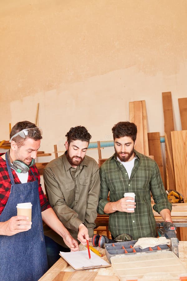 Carpenter Team Discusses Order Stock Photos - Free & Royalty-Free Stock ...