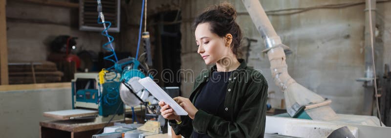 Young Carpenter Using Digital Tablet in Stock Image - Image of casual ...