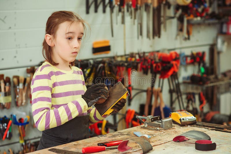 Young Carpenter Working in Craft Workshop. Creative Student Doing His ...