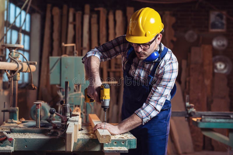 Carpenter Working with a Hand Tool on the Work Bench Stock Image ...