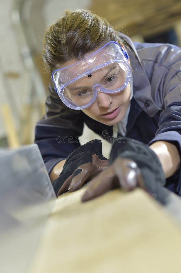 Young Carpentry Apprentice Working Stock Photo - Image of woman ...