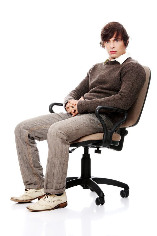Young Casual Man on a Chair Stock Image - Image of contemporary, full ...