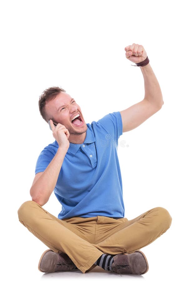 Young Man Cheering with Legs Crossed Stock Image - Image of shout ... Young Man Cheering with Legs Crossed Stock Image - Image of shout ...