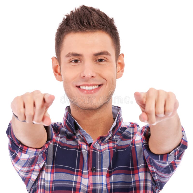 Young casual man pointing stock image. Image of modern - 24765959