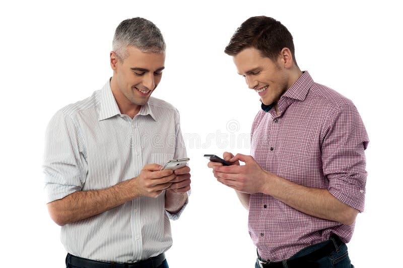 Young Casual Men Using Their Smart Phone Stock Photo - Image of ...