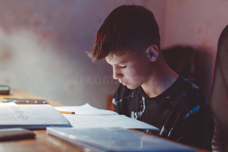 Young Diligent Boy Learning at Evening Stock Image - Image of pupil ...