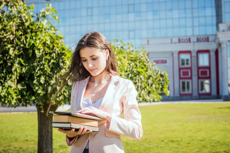 Young Caucasian Female Student with Books on Campus, Student Stu Stock ...