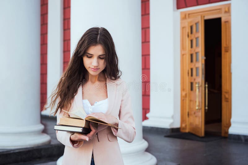 Young Caucasian Female Student with Books on Campus, Student Stu Stock ...
