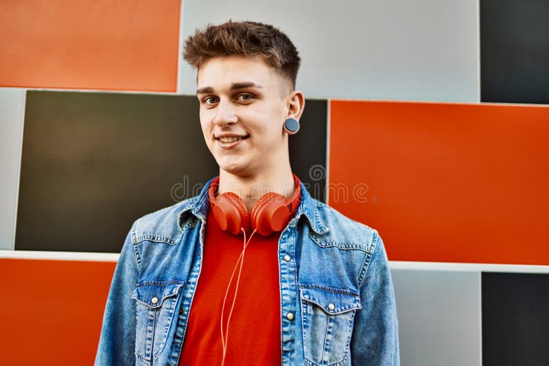 Young Caucasian Guy Smiling Leaning on the Wall Stock Image - Image of ...