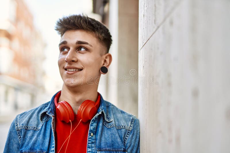 Young Caucasian Guy Smiling Leaning on the Wall Stock Image - Image of ...