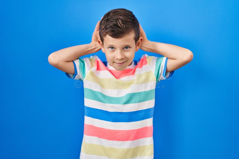 Young Caucasian Kid Standing Over Blue Background Doing Bunny Ears ...