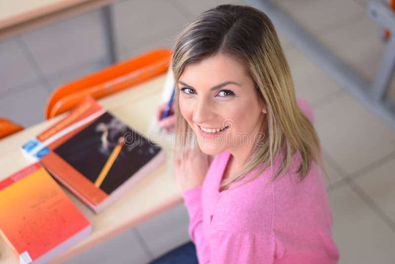 Young Caucasian Lady Student Looking at Camera and Smiling. Learning ...