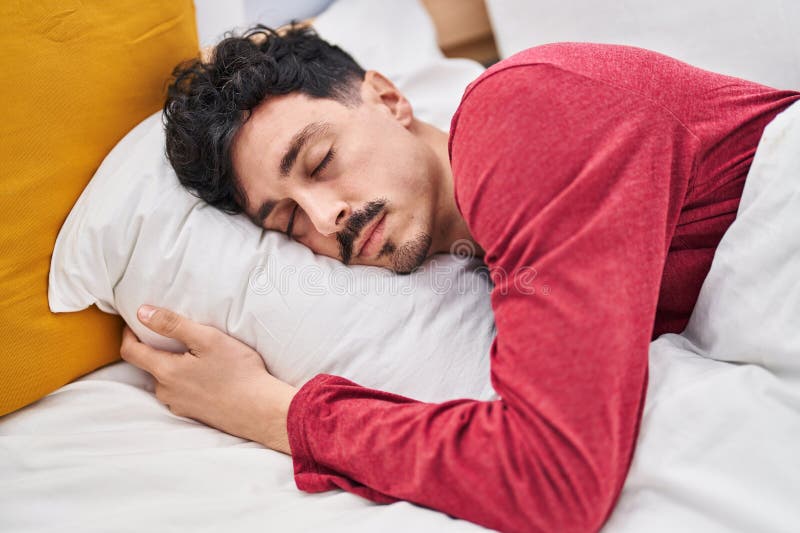 Young Caucasian Man Lying on Bed Sleeping at Bedroom Stock Image ...