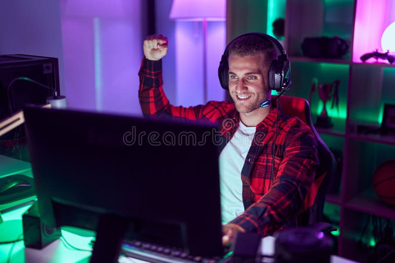 Young Caucasian Man Streamer Playing Video Game with Winner Expression ...