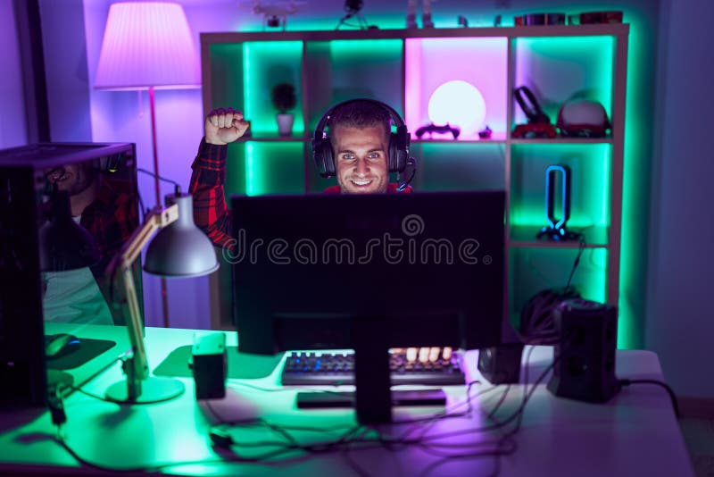 Young Caucasian Man Streamer Playing Video Game with Winner Expression ...