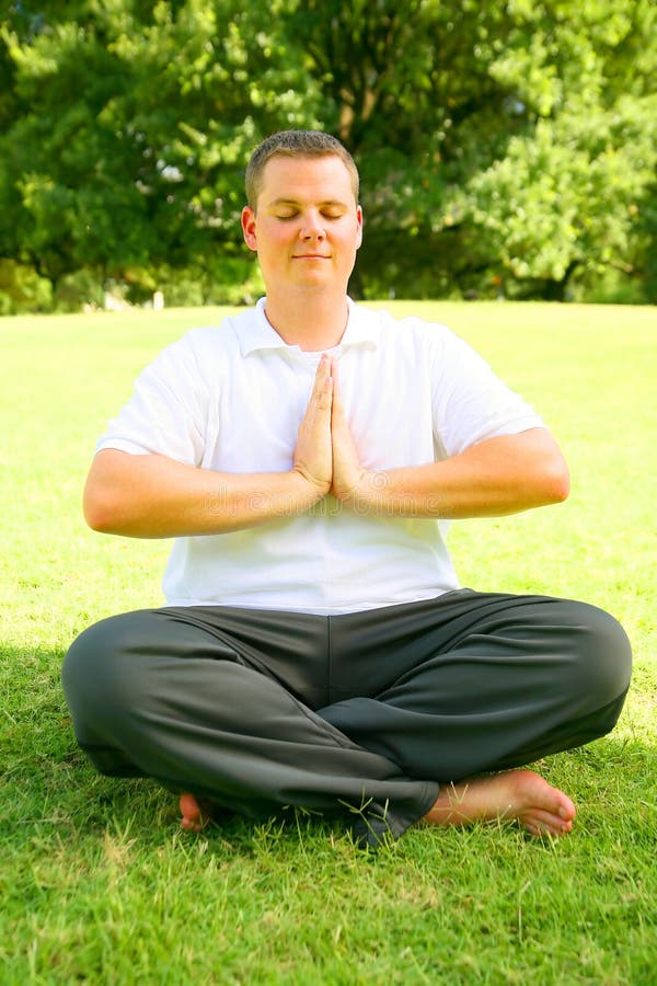 Young Caucasian Meditate in Park Stock Photo - Image of outdoor, face ...
