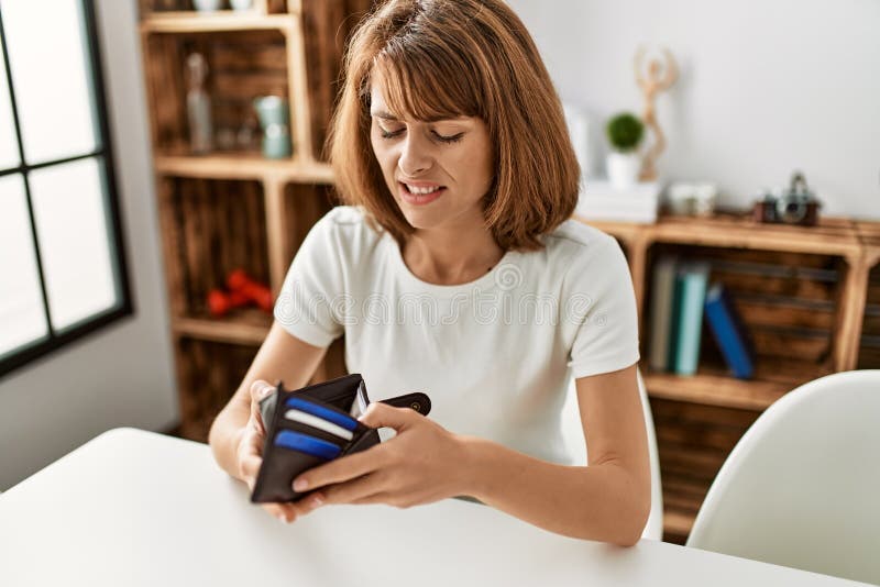 Young Caucasian Woman Looking Empty Wallet at Home Stock Photo - Image ...