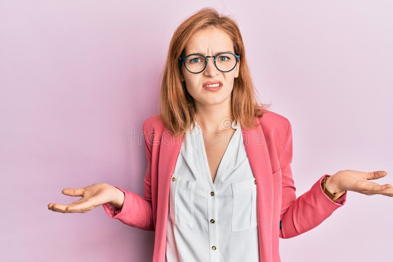 Young Caucasian Woman Wearing Business Style and Glasses Clueless and ... Young Caucasian Woman Wearing Business Style and Glasses Clueless and ...