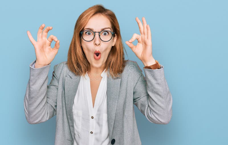 Young Caucasian Woman Wearing Business Style and Glasses Looking ... Young Caucasian Woman Wearing Business Style and Glasses Looking ...