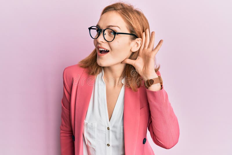 Young Caucasian Woman Wearing Business Style and Glasses Smiling with ... Young Caucasian Woman Wearing Business Style and Glasses Smiling with ...
