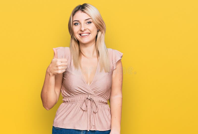 Young Caucasian Woman Wearing Casual Clothes Doing Happy Thumbs Up