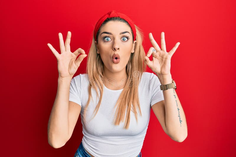 Young Caucasian Woman Wearing Casual White T Shirt Looking Surprised