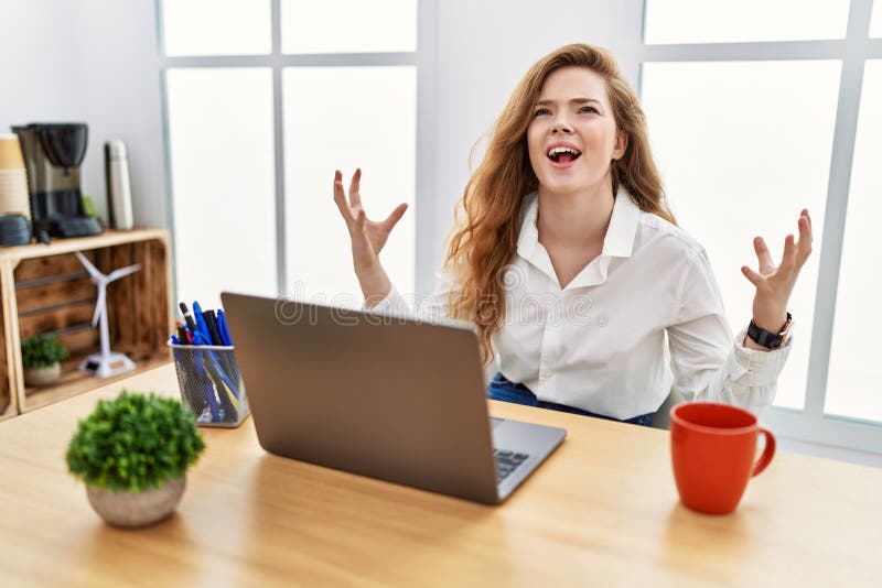 Young Caucasian Woman Working at the Office Using Computer Laptop Crazy ...