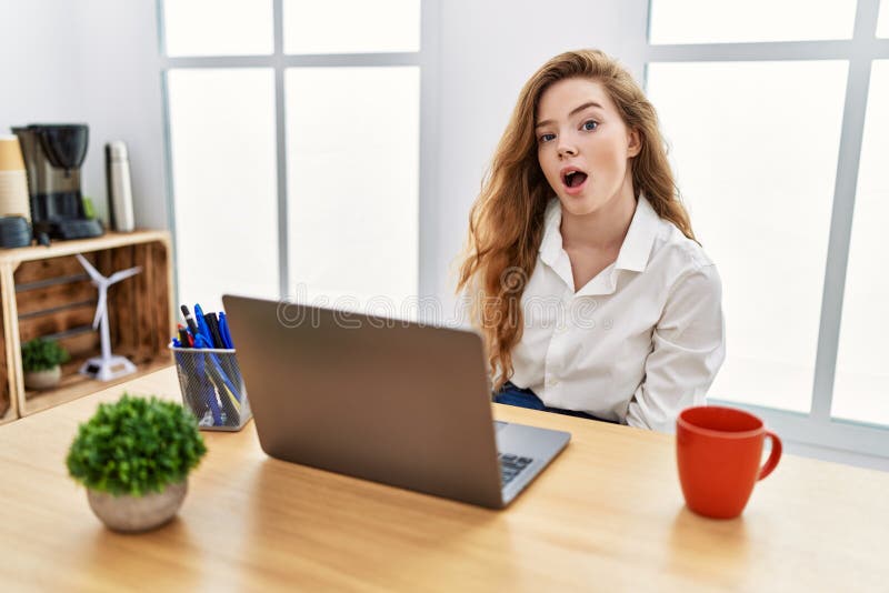 Young Caucasian Woman Working at the Office Using Computer Laptop in ...