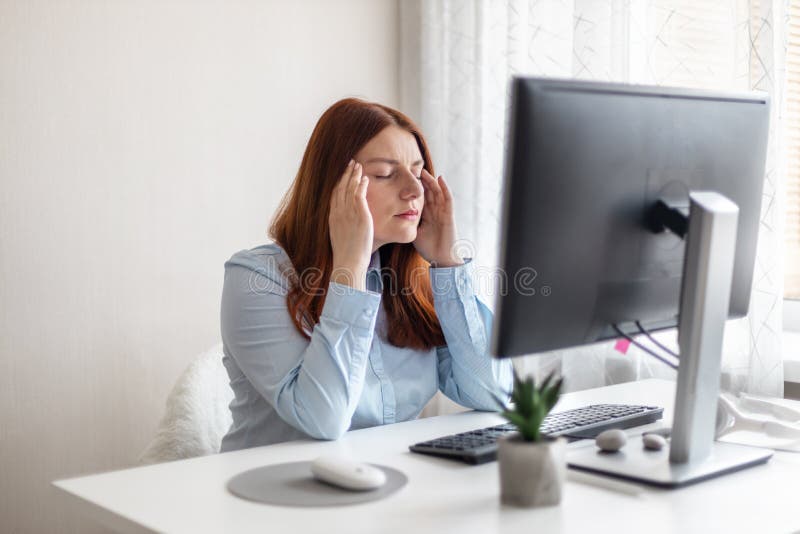 Young Caucasian Women are Stressed and Tired from Work at a White Desk ...