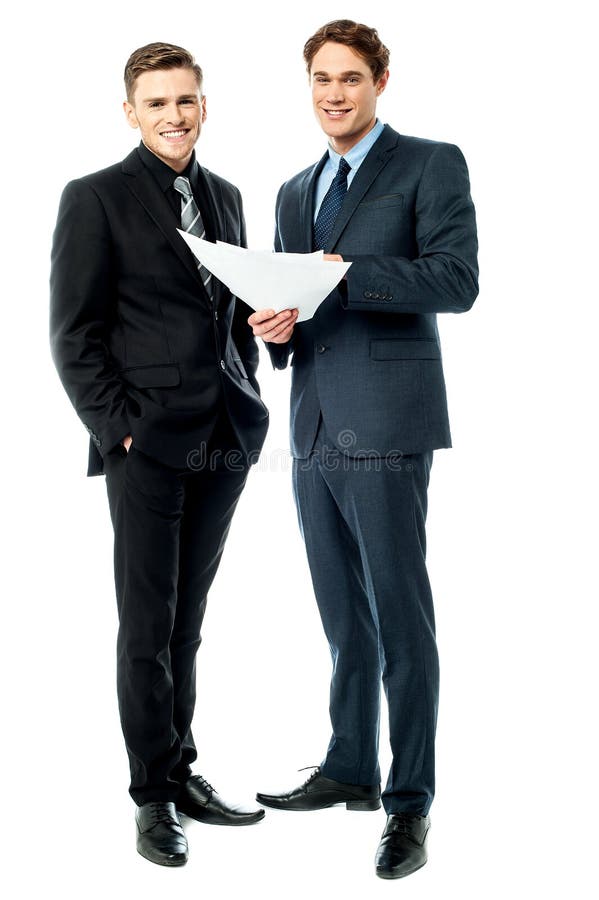 Young Ceo S Discussing Business Plan Stock Photo - Image of dressed ...