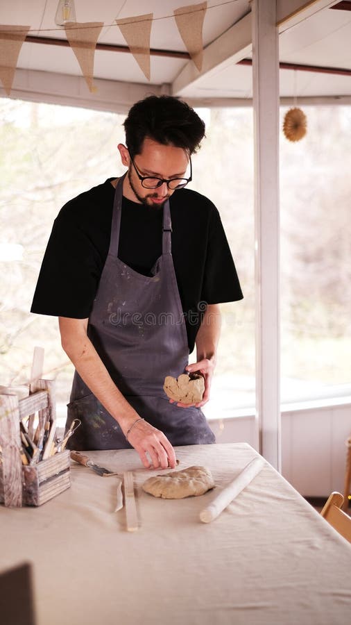 A Man at a Clay Modeling Master Class Learns How To Make Dishes Stock ...