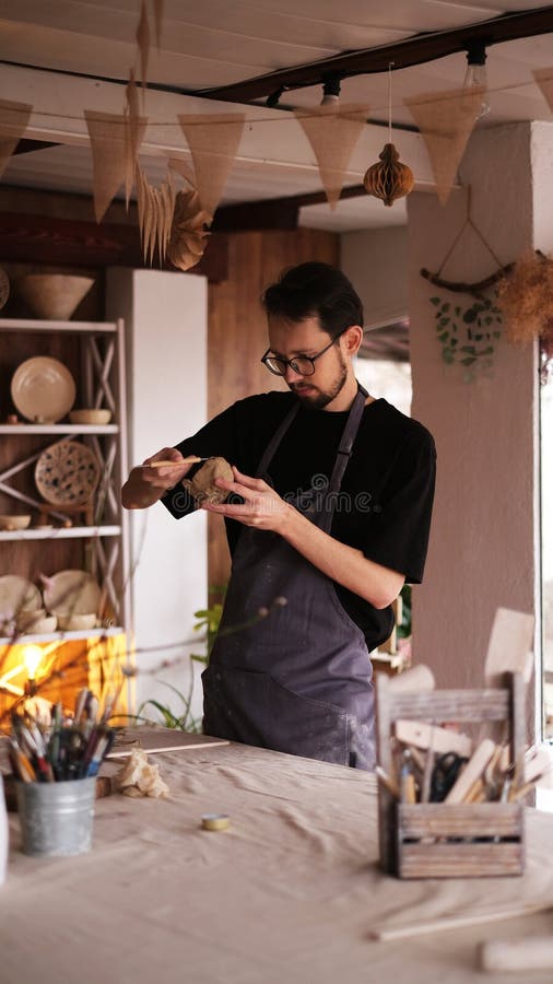 A Man at a Clay Modeling Master Class Learns How To Make Dishes Stock ...